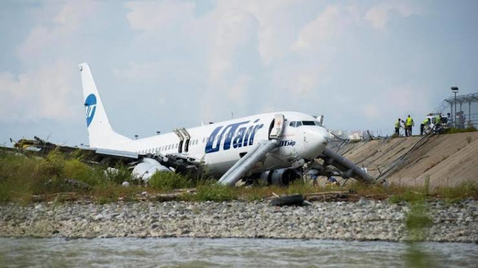 Boeing 737 Plane Skids Off Runway into Water